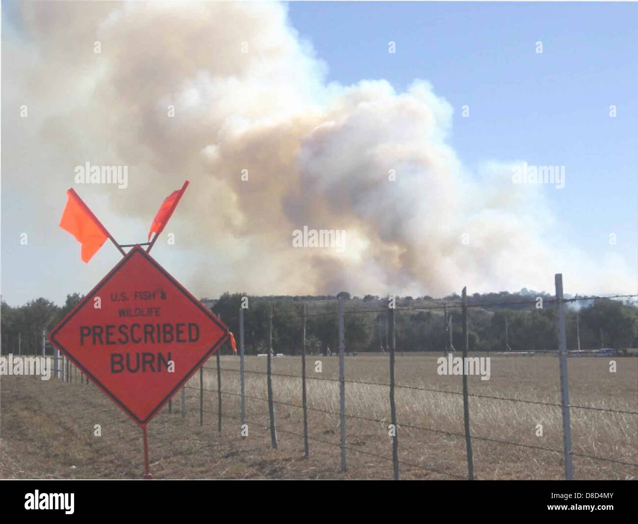 A sign marking an area designated for a prescribed burn, part of forest ...