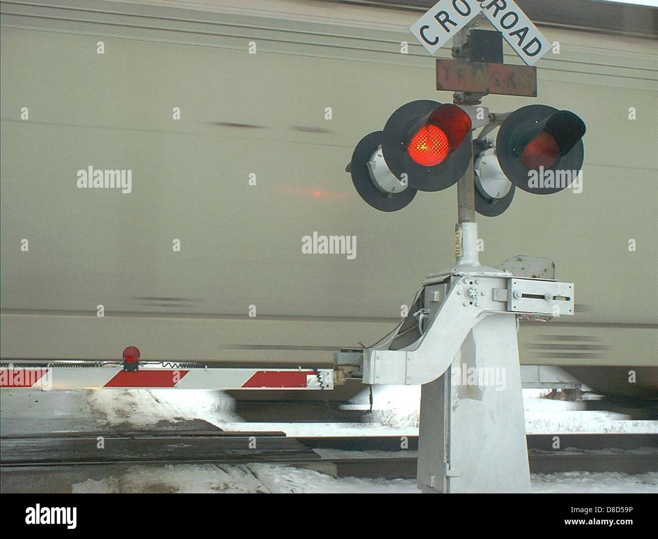 A railroad crossing arm is shown in operation in Byron, Illinois ...