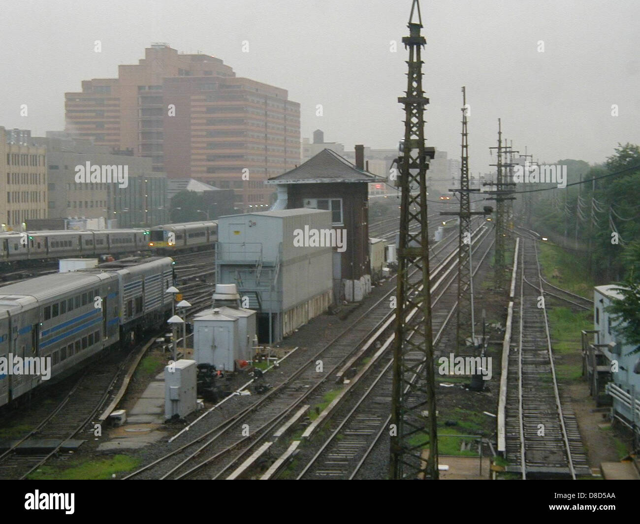 A train traveling along a railroad track, with the surrounding scenery ...