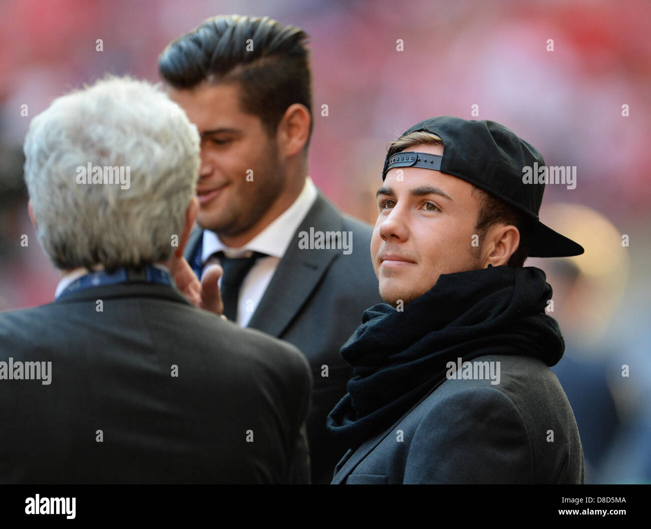 Dortmund's injured Mario Goetze (R) is seen prior to the UEFA soccer ...