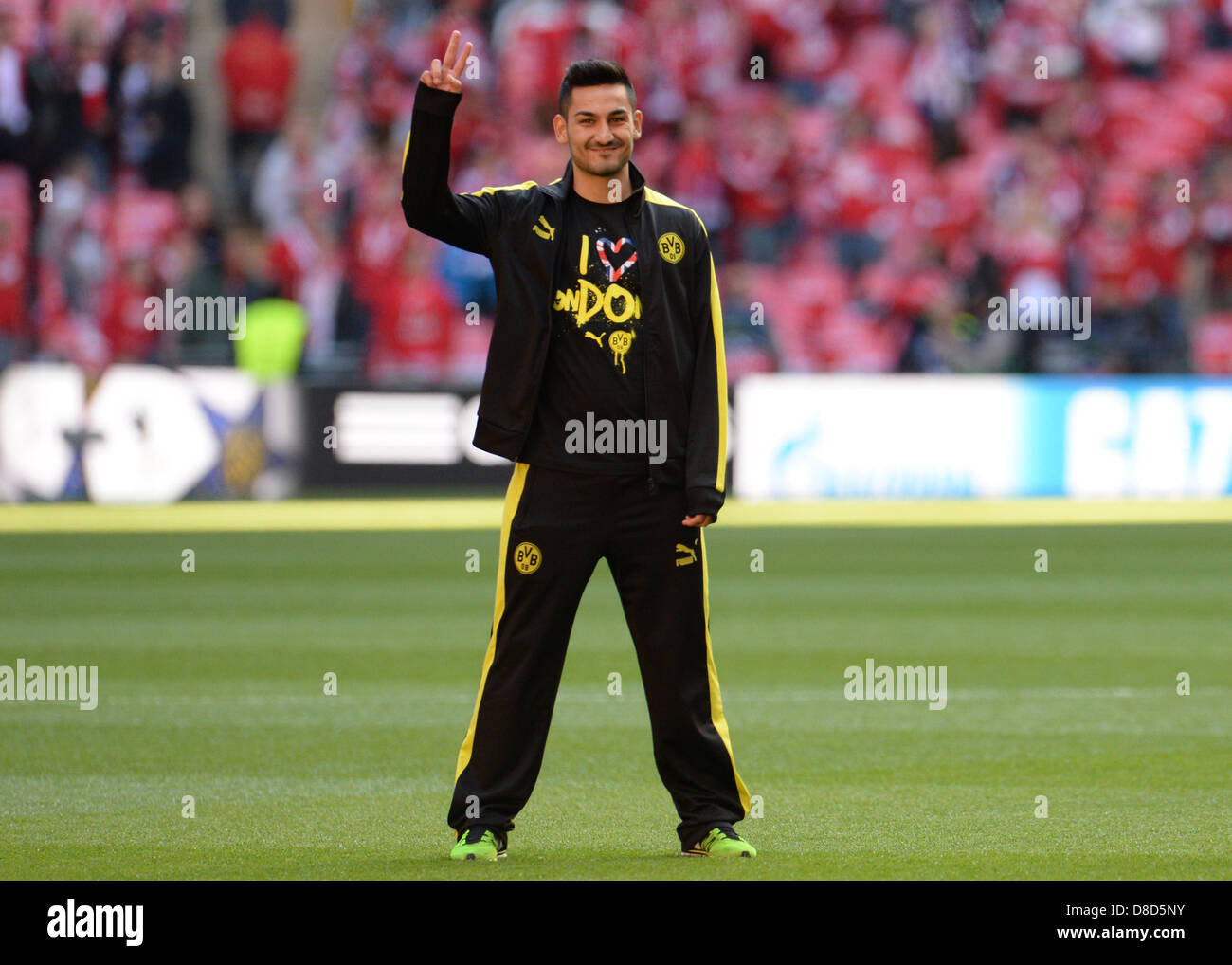Dortmund's Ilkay Guendogan poses on the pitch prior to the UEFA soccer ...