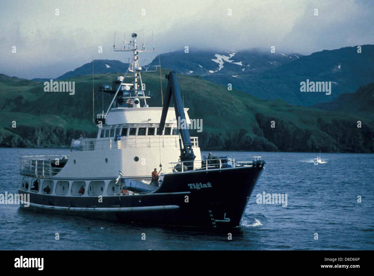 A large research vessel at sea, used for scientific exploration and ...