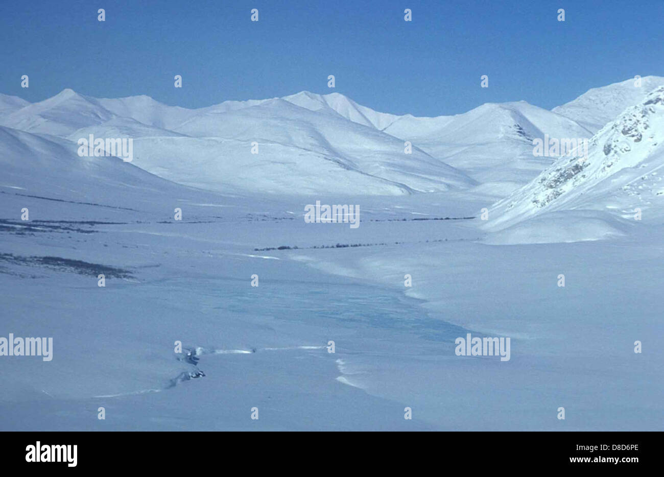Towering mountains surround serene hi-res stock photography and images ...