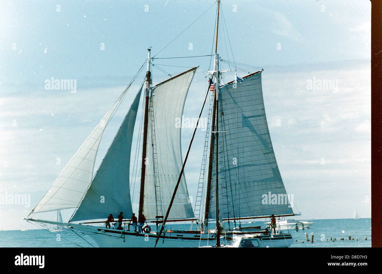 An old photo of a sailboat gliding across Lake Michigan, capturing the ...