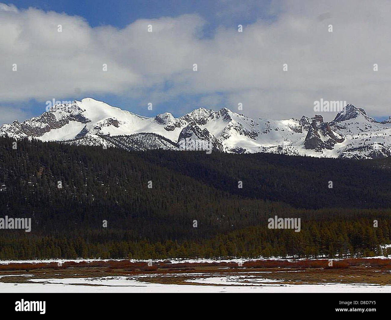 The snow-capped peaks of the Sawtooth Mountains in winter, offering a ...