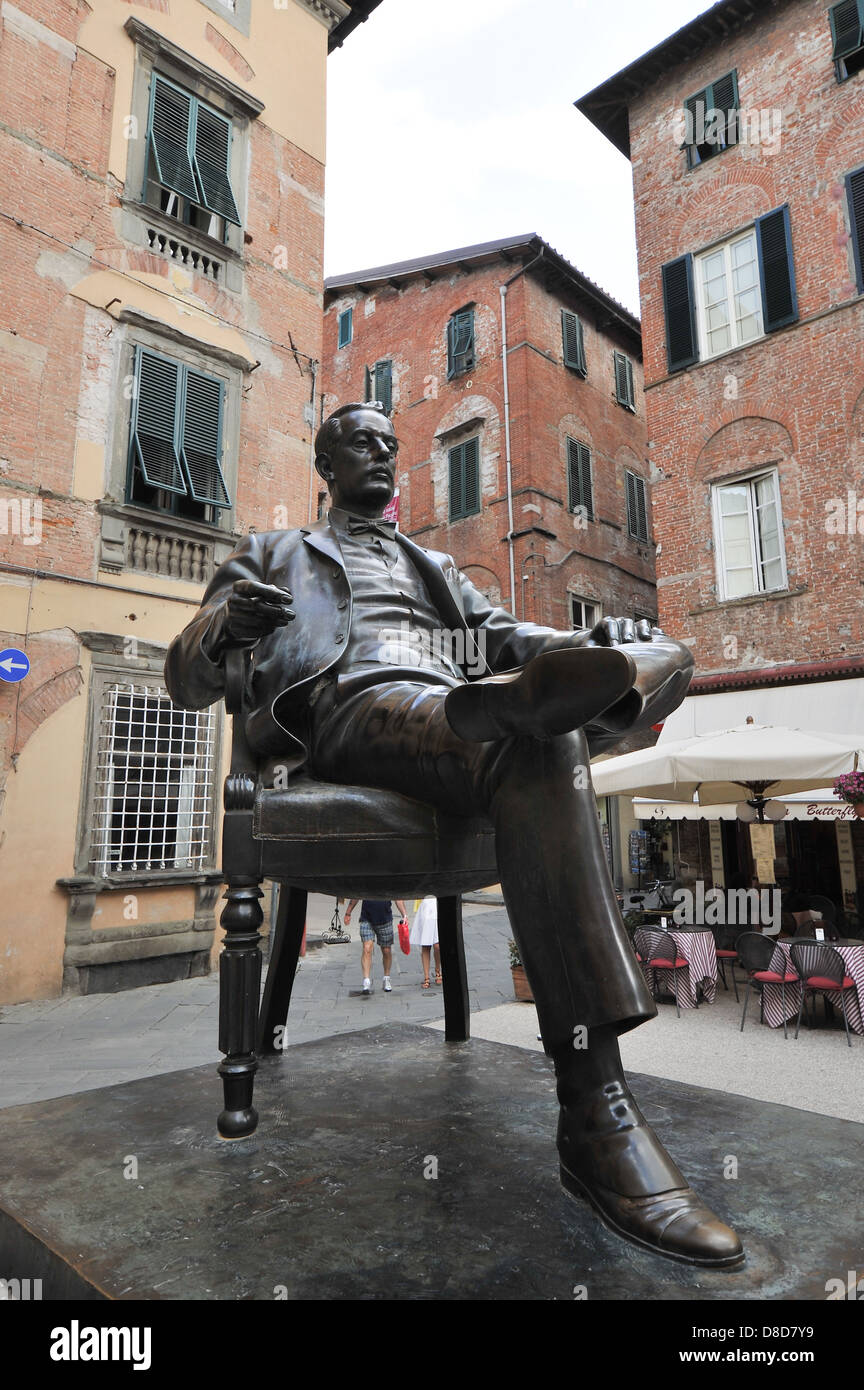 Bronze statue of Giacomo Puccini in front of his birthplace close to ...