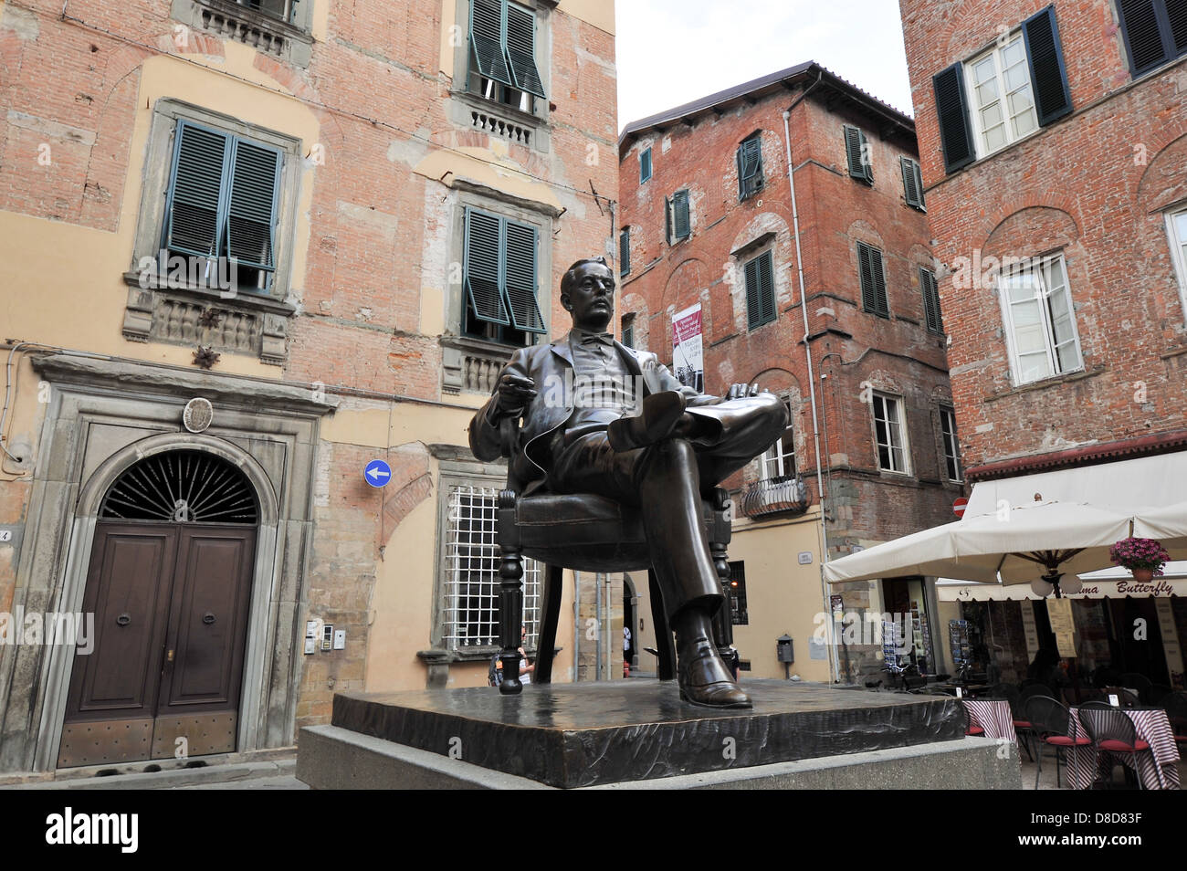 Bronze statue of Giacomo Puccini in front of his birthplace close to ...