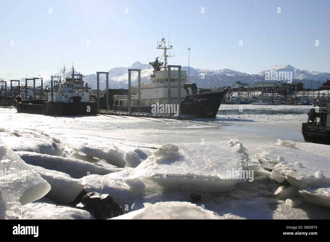Ships preparing to break ice on water Stock Photo - Alamy
