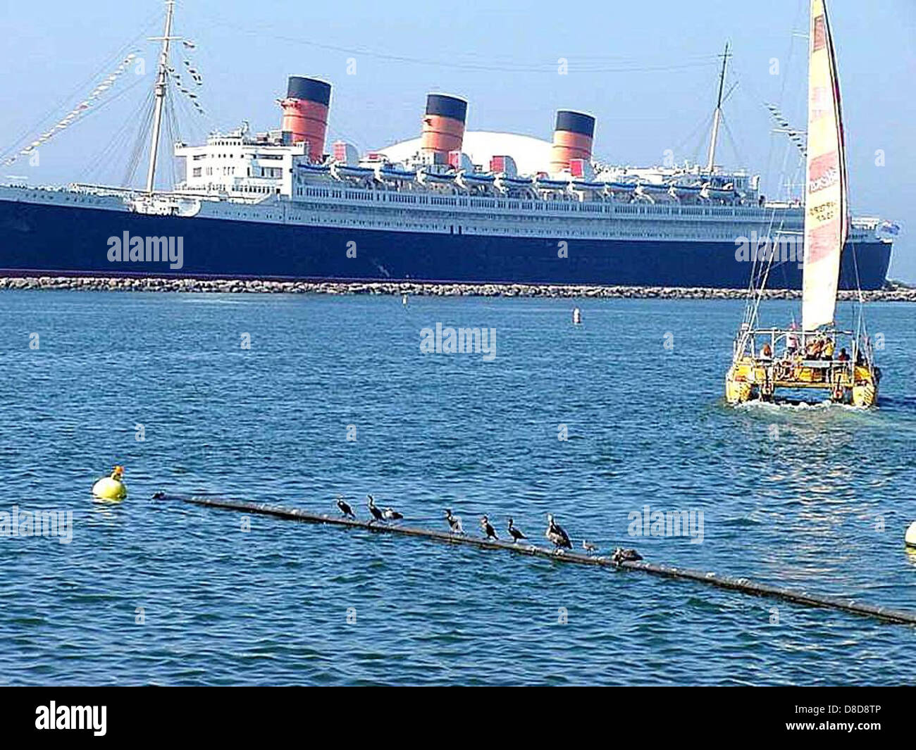 This image shows the RMS Queen Mary, a retired British ocean liner ...