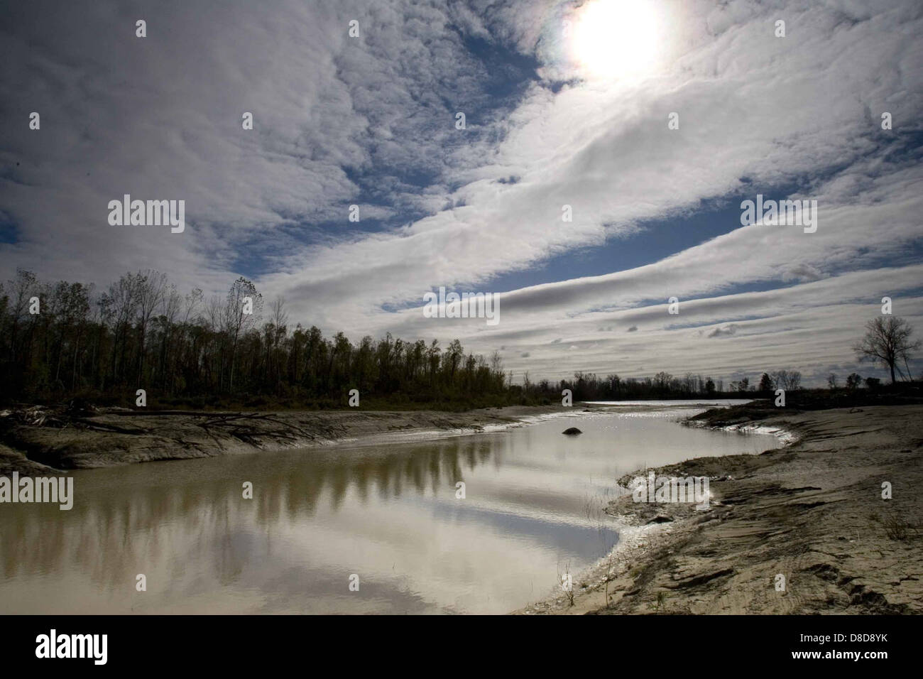 The image shows a side channel of the Missouri River, where erosion has ...