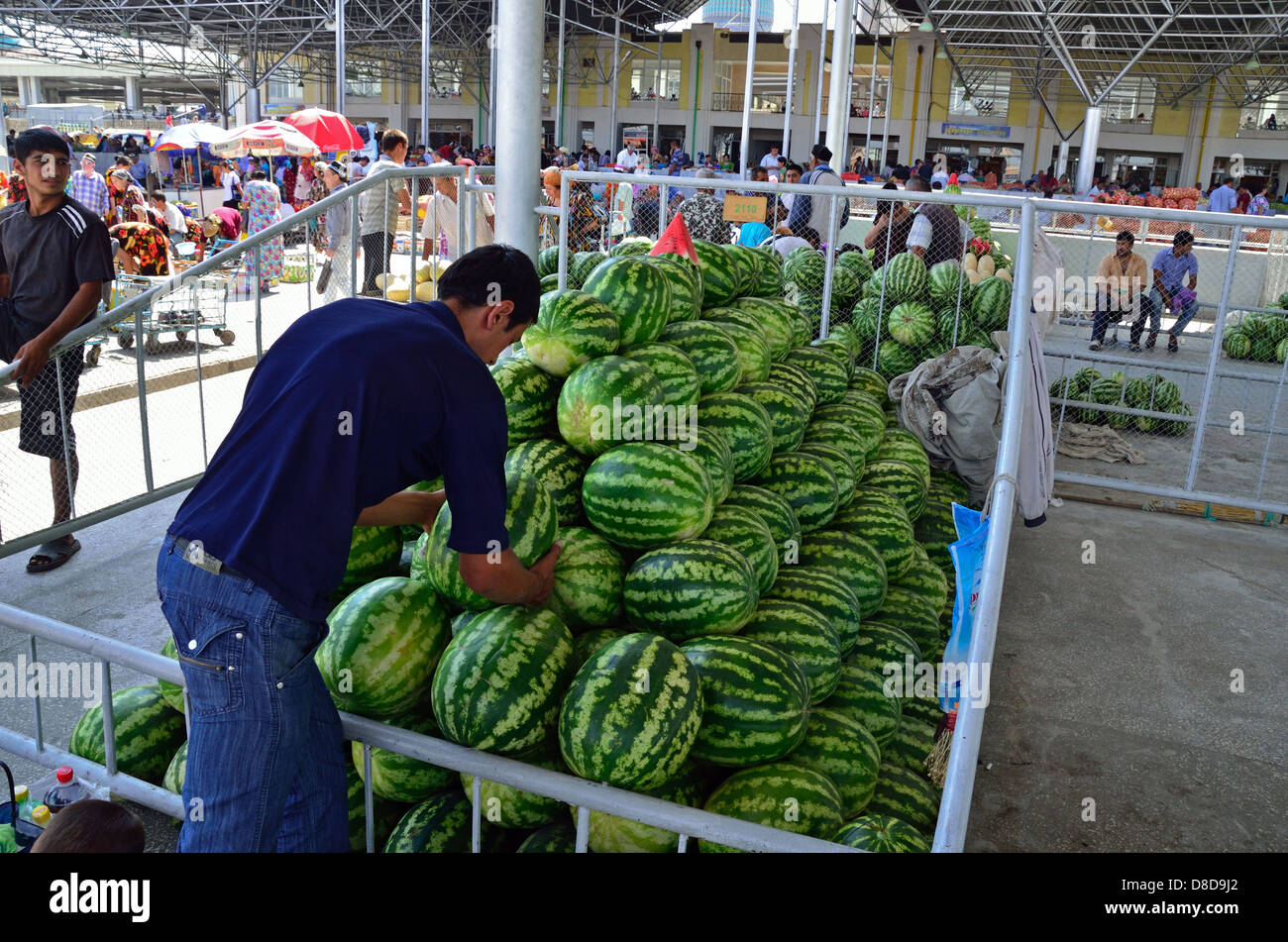 Man selling watermelons at Siob Bazaar in Samarkand Stock Photo - Alamy