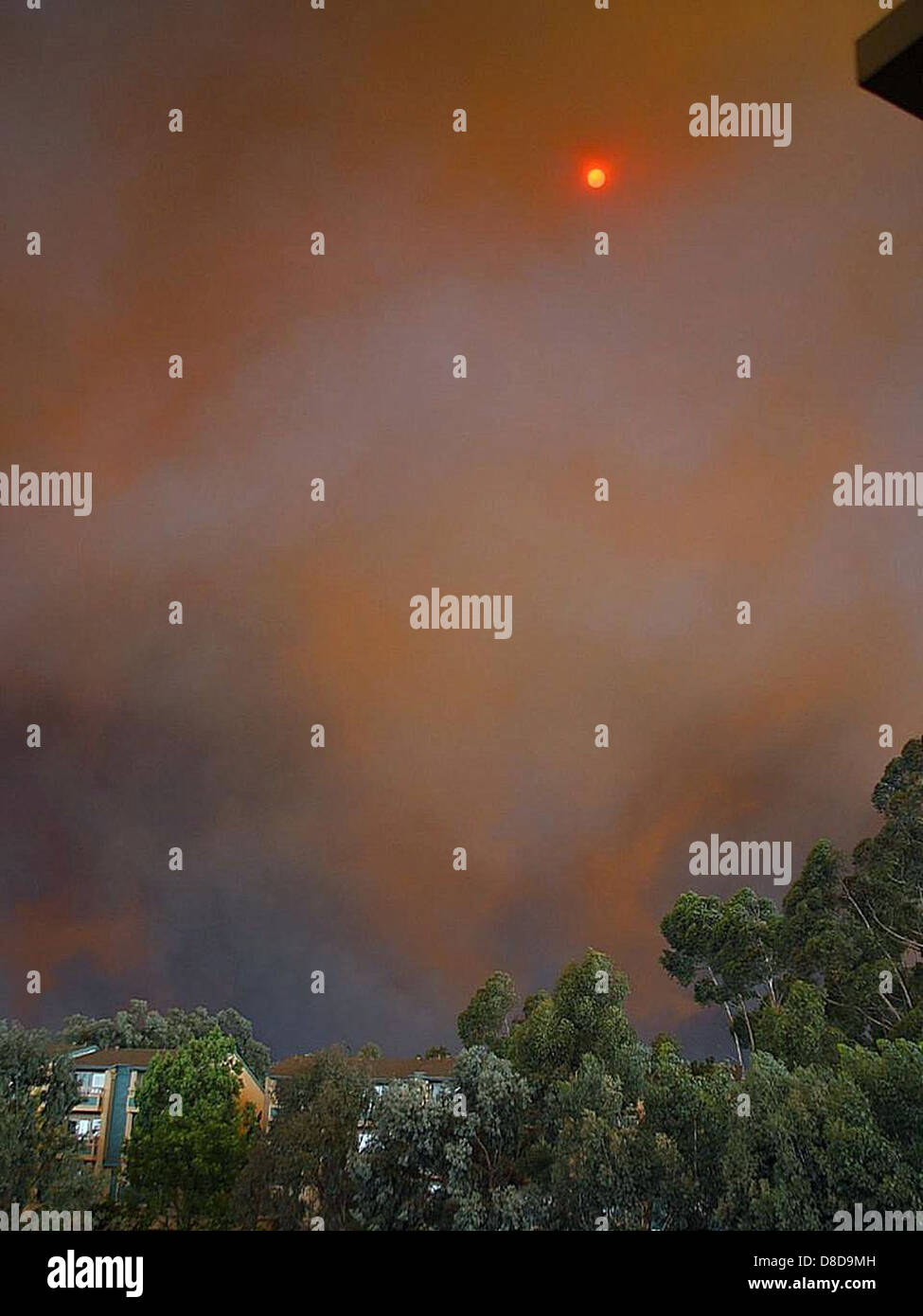 The sun is seen through smoky skies caused by nearby fires. This ...