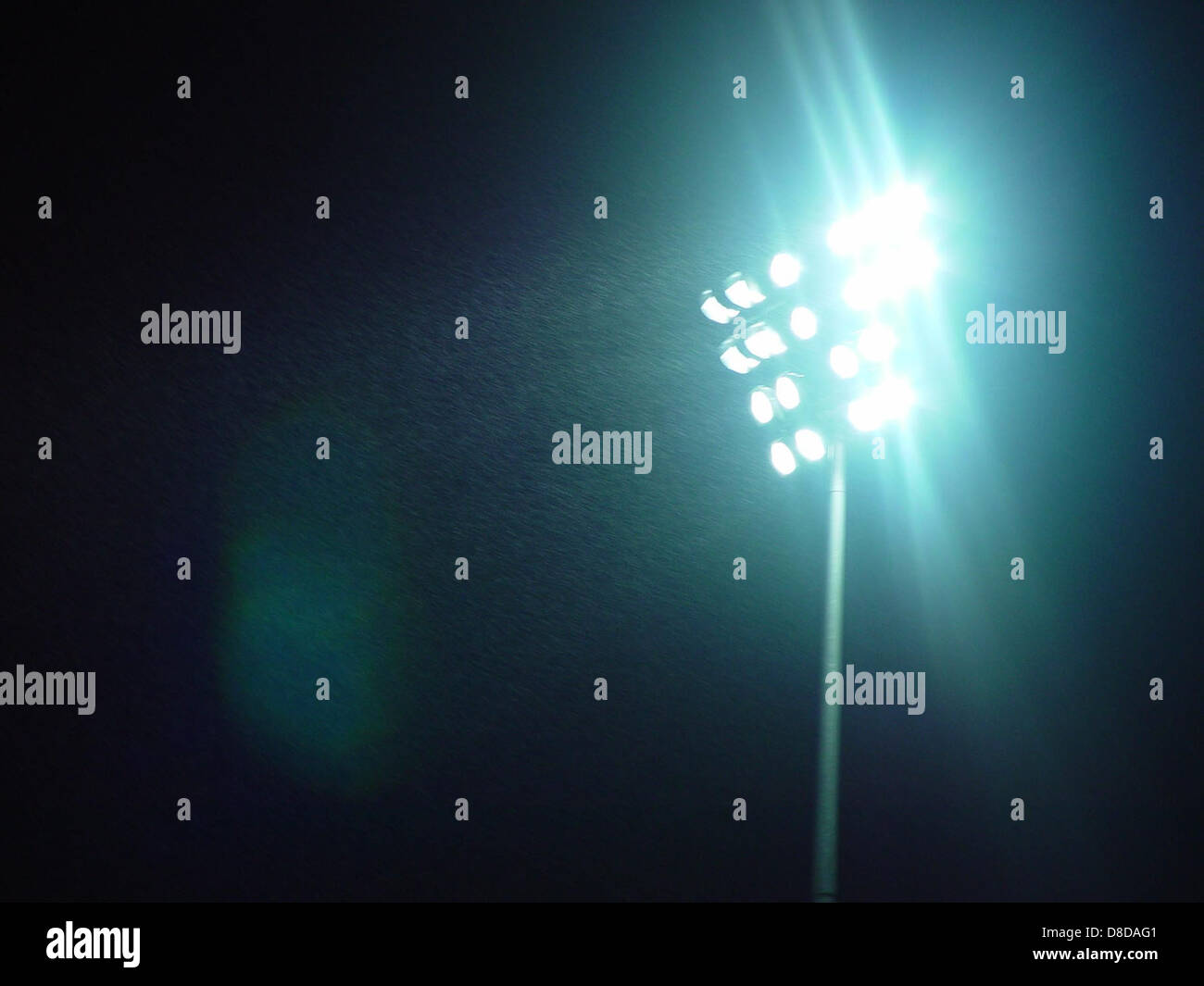 Stadium lights are used to illuminate sports arenas, providing ...