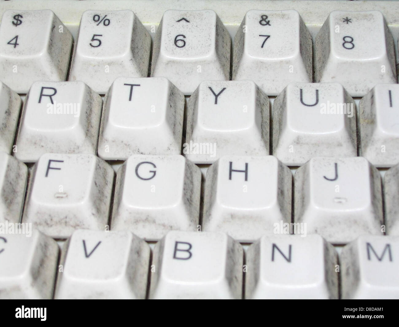 A close-up image of standard white computer keyboard keys. The clean ...