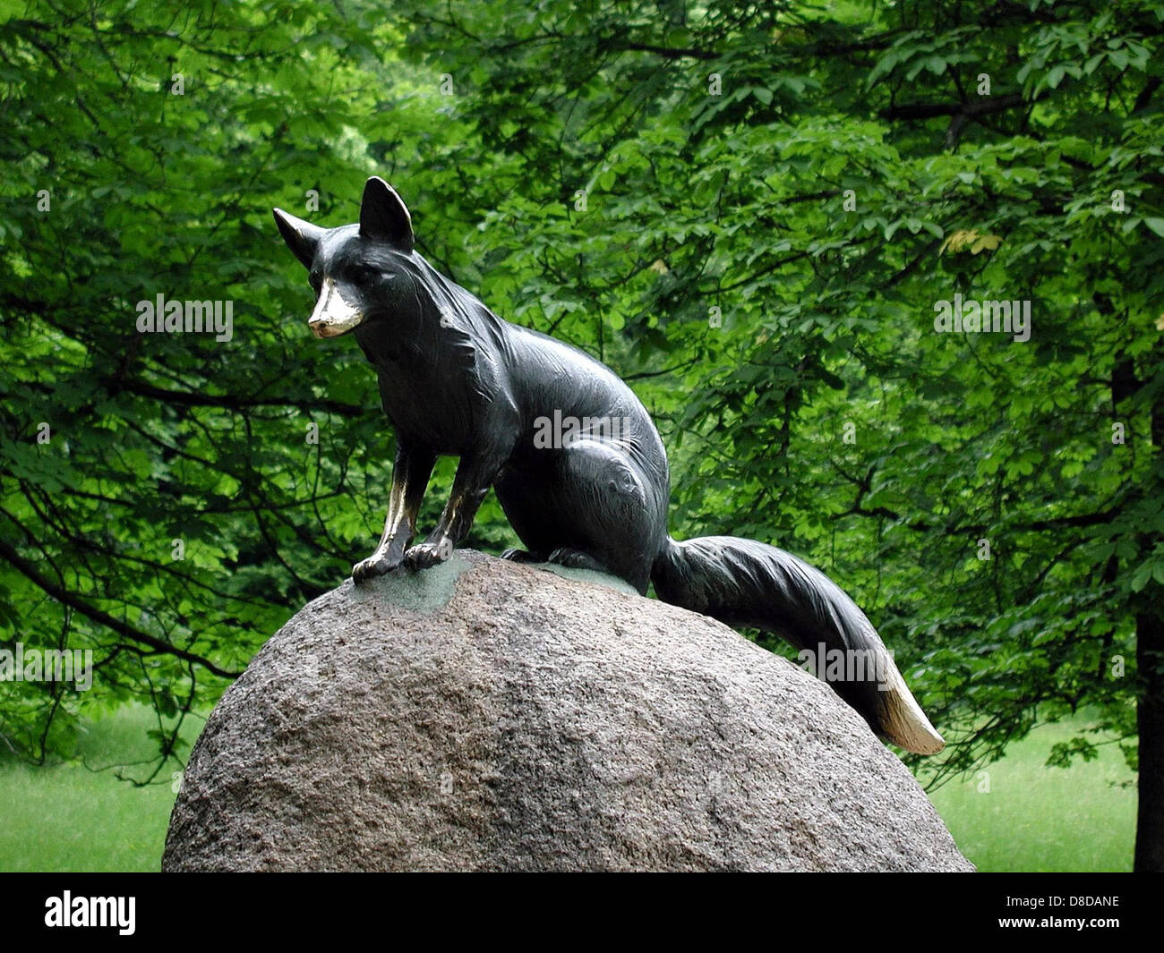 A detailed statue of a fox, showcasing the intricate craftsmanship and ...
