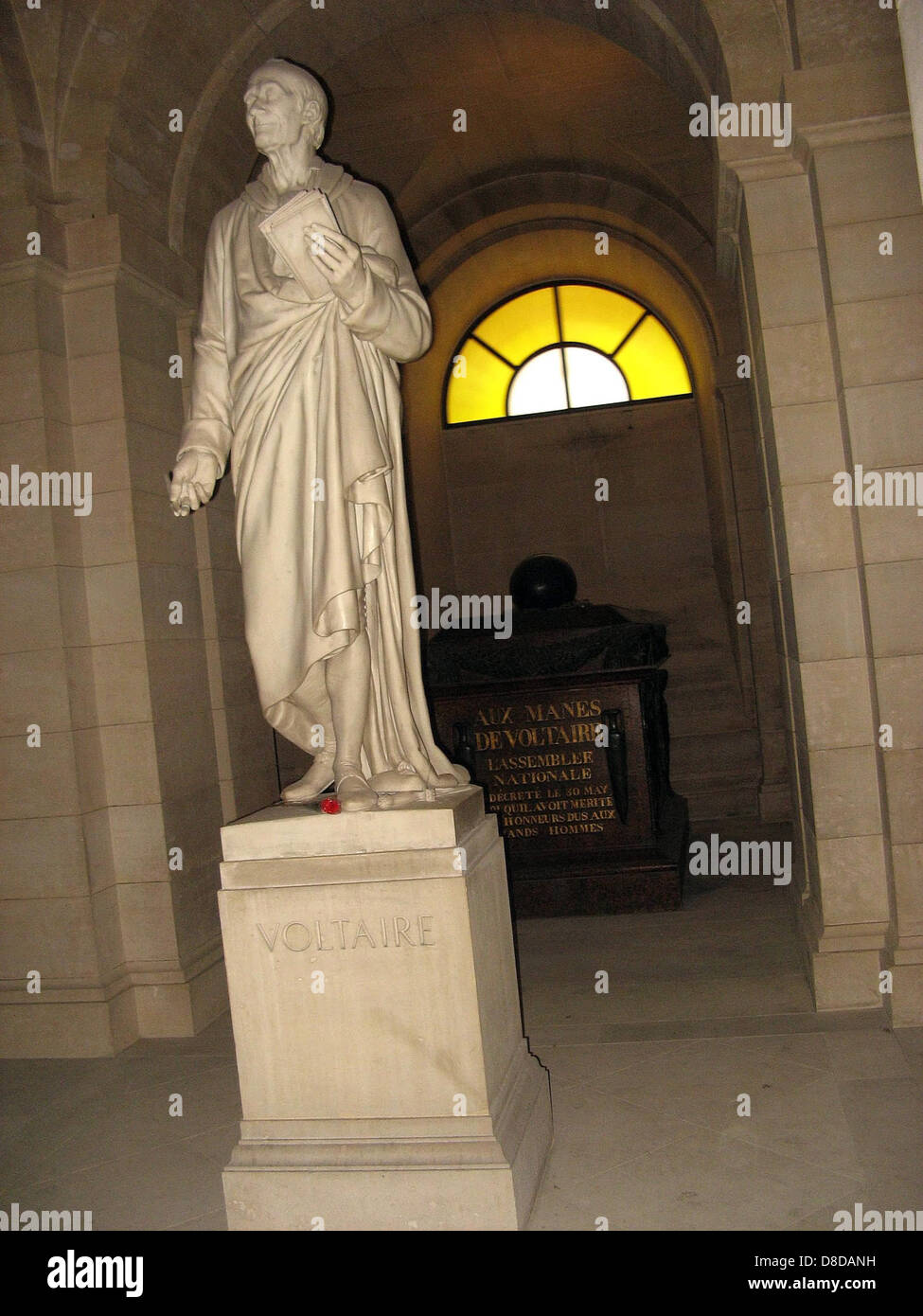 A statue inside a church, depicting a religious figure. The sculpture ...