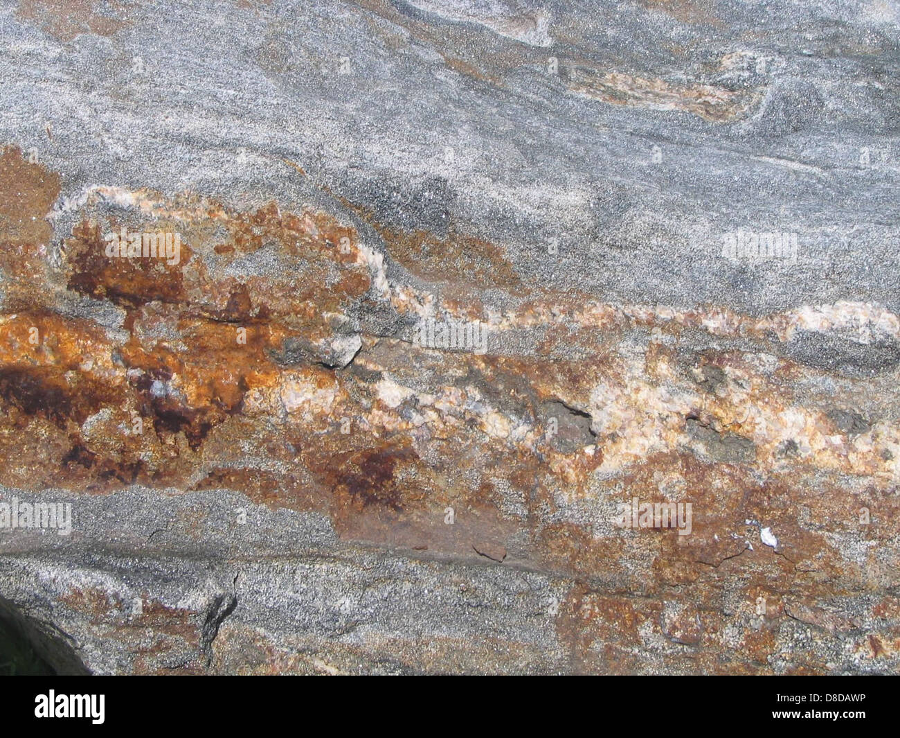 A close-up of a marble stone surface, showcasing intricate veining ...