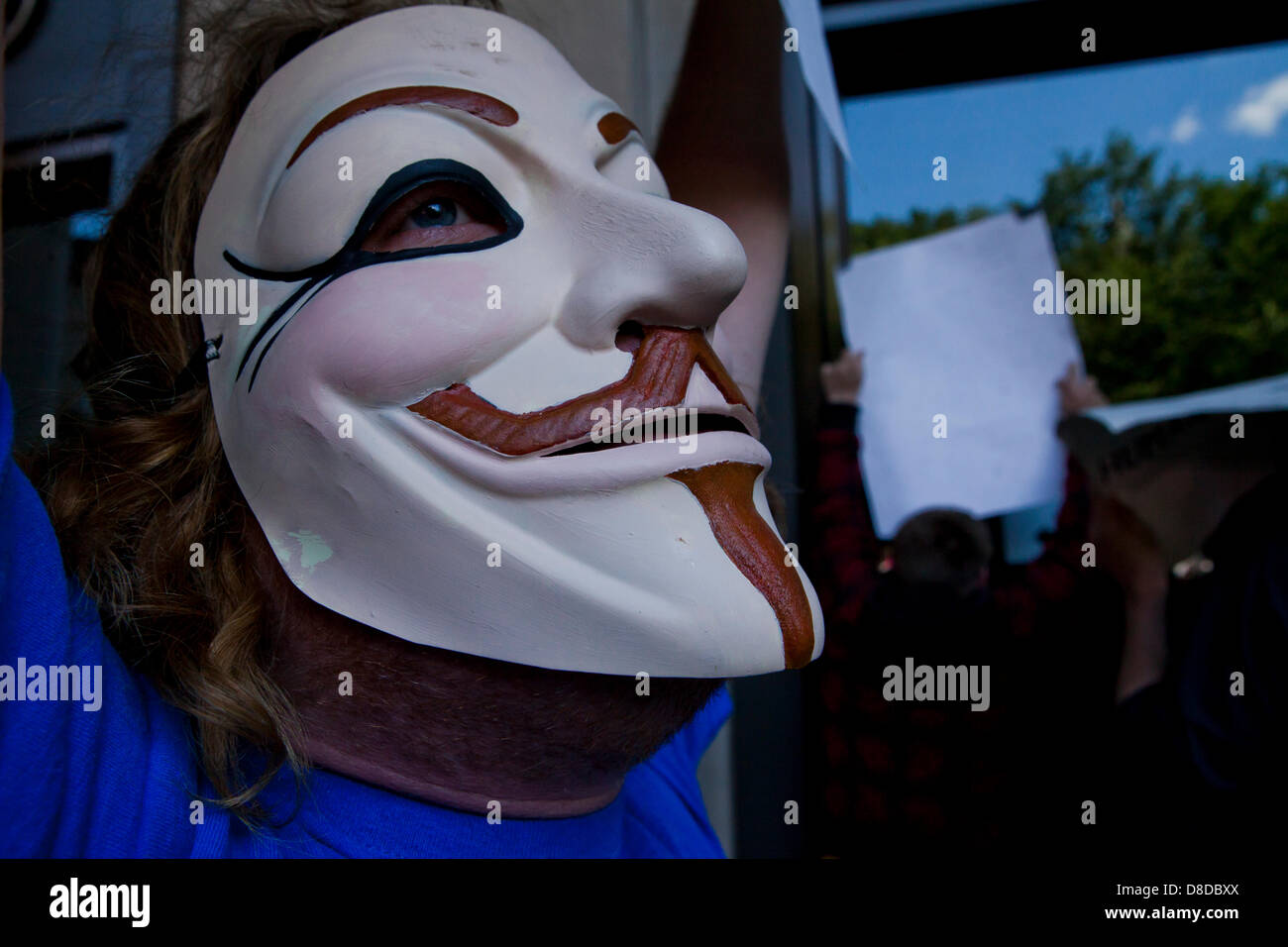 man wearing Guy Fawkes mask Stock Photo - Alamy