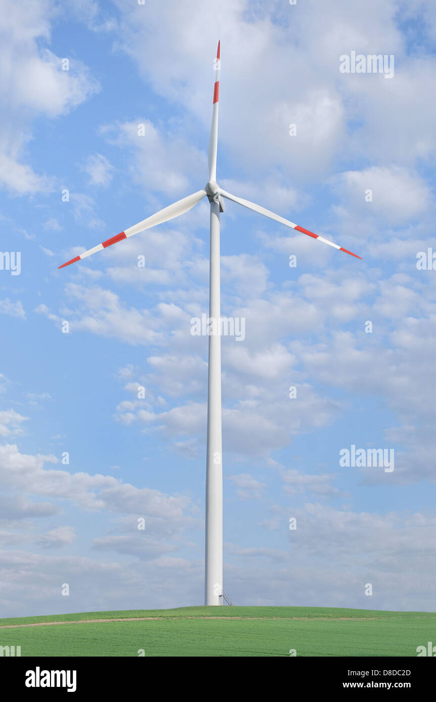 Wind generator turbine power energy on grass field Stock Photo - Alamy