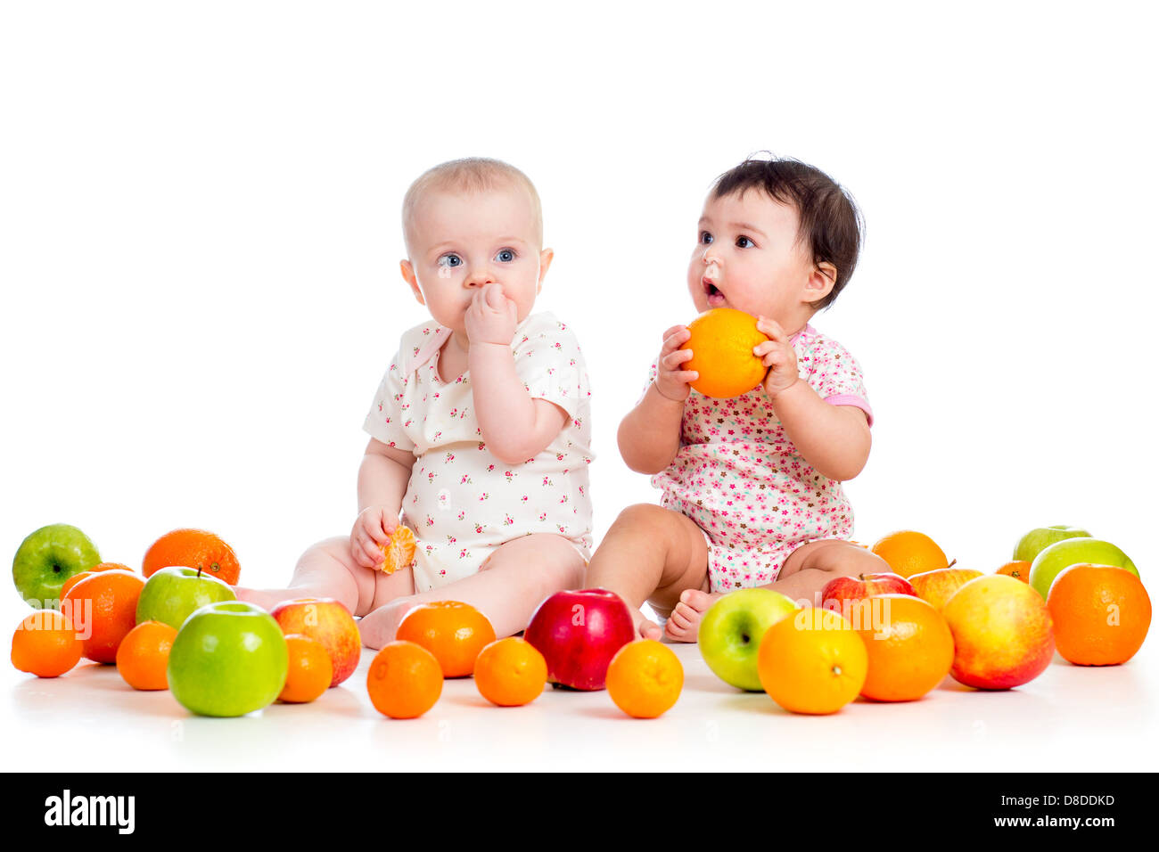 babies eating fruits Stock Photo - Alamy