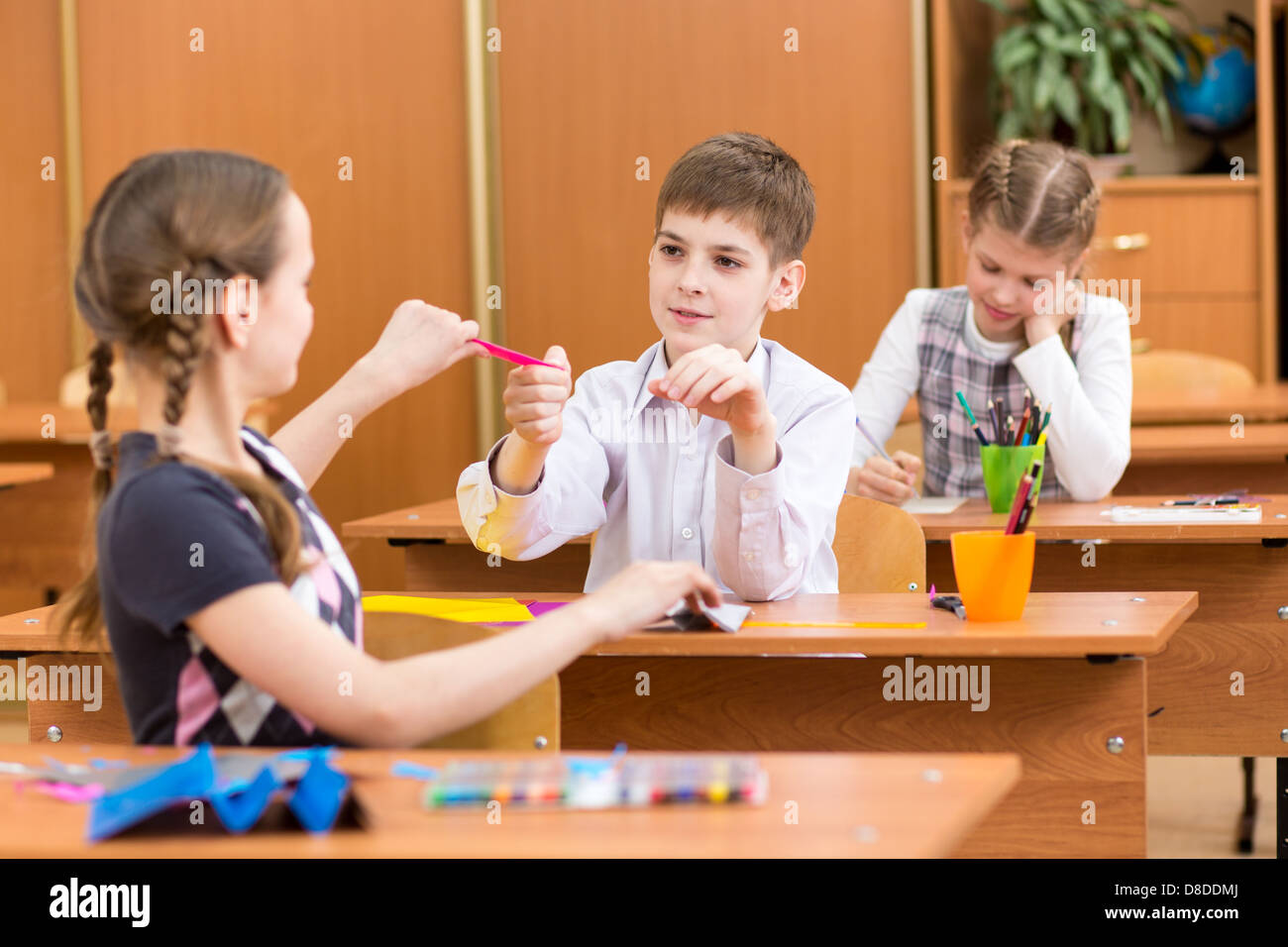 schoolkids work at lesson Stock Photo - Alamy