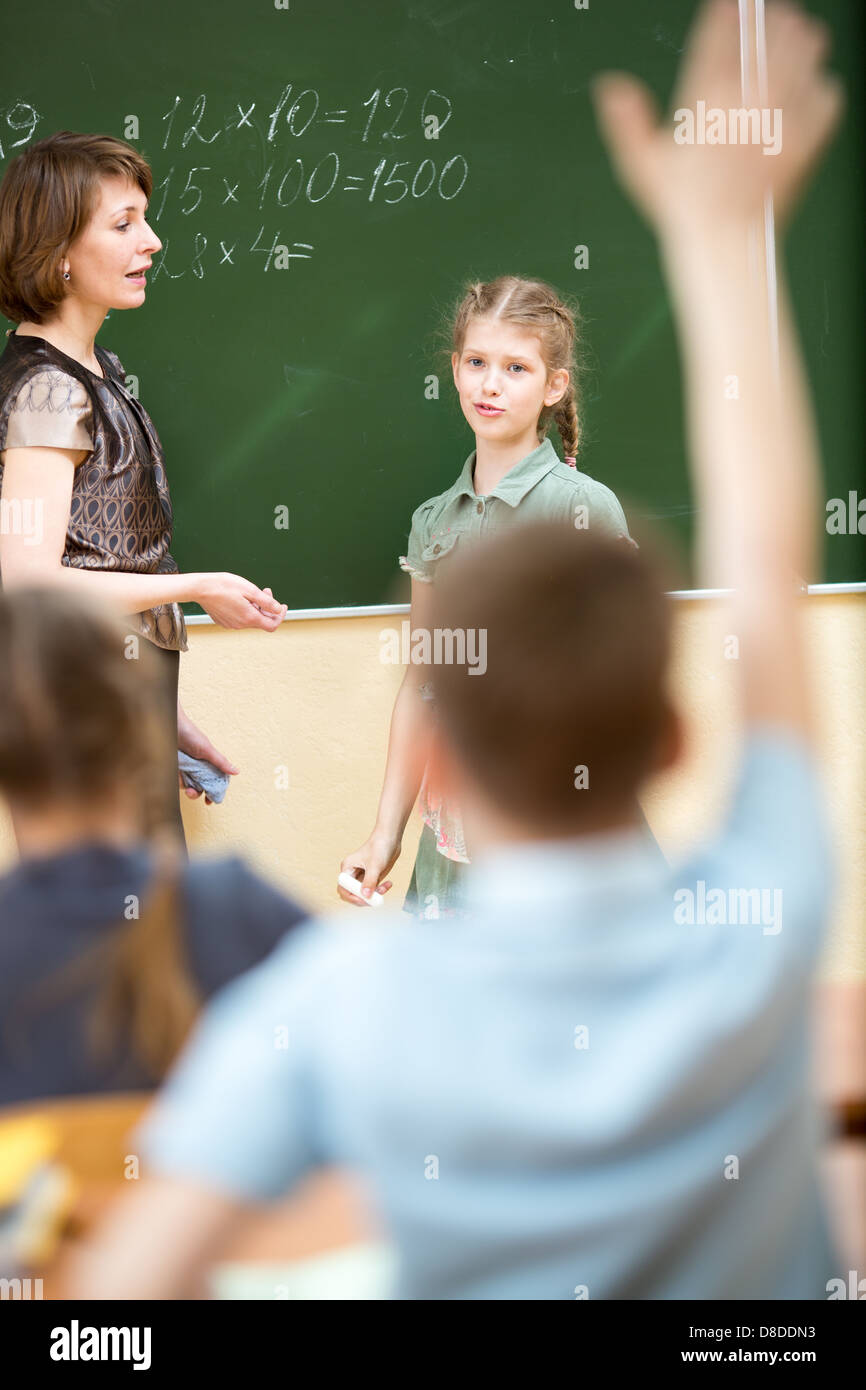 School kids in classroom at math lesson Stock Photo - Alamy