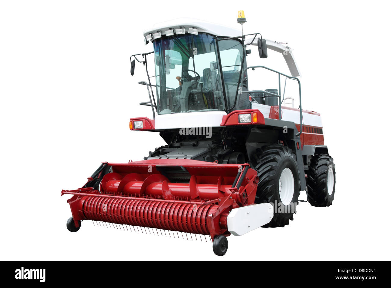 Red modern combine separately on a white background Stock Photo - Alamy