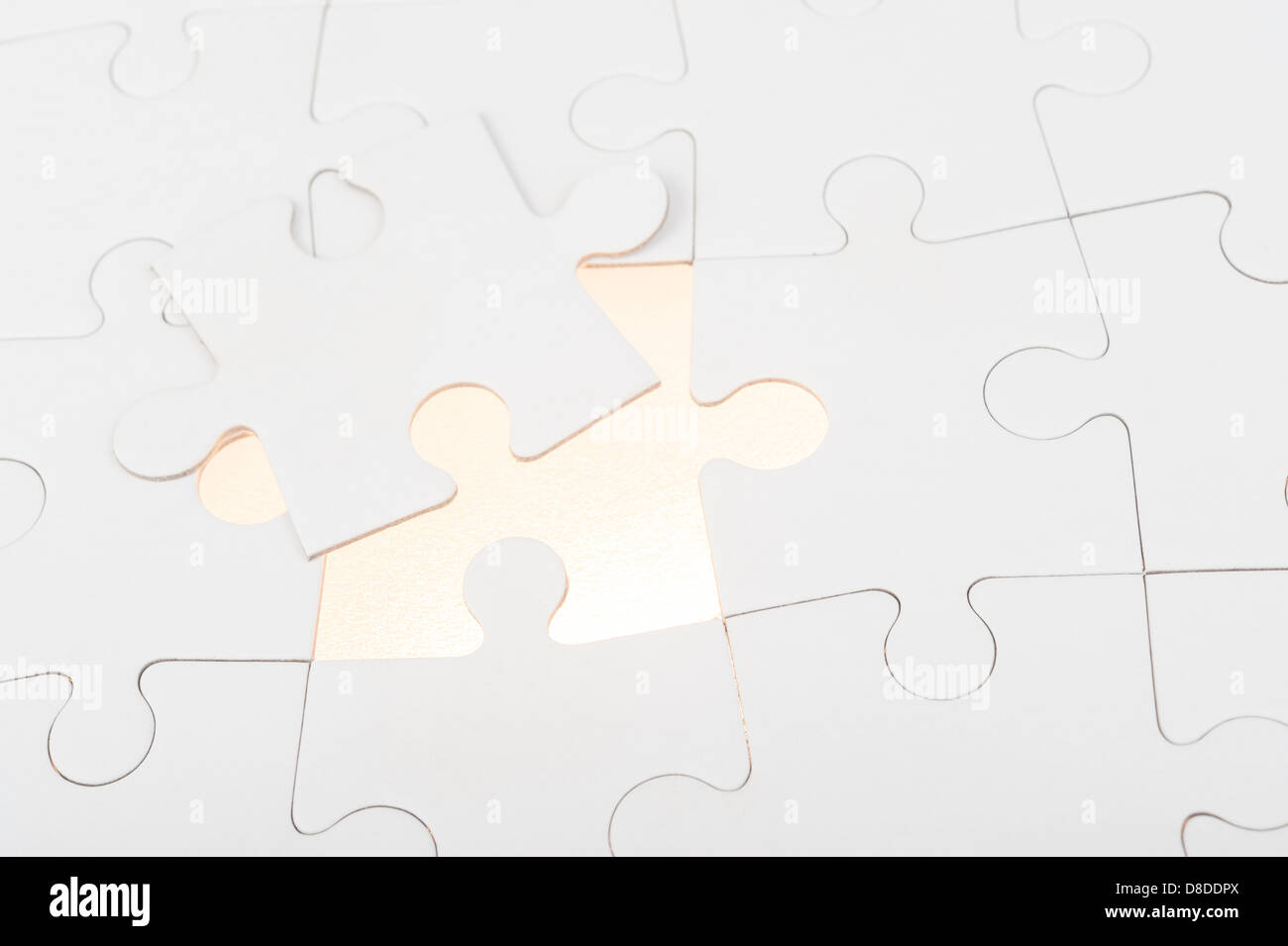 Group of white paper jigsaw puzzles Stock Photo - Alamy