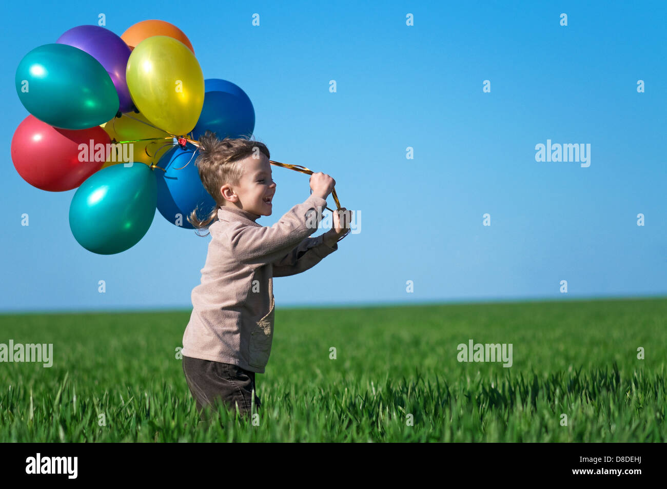 Child and balloon hi-res stock photography and images - Alamy