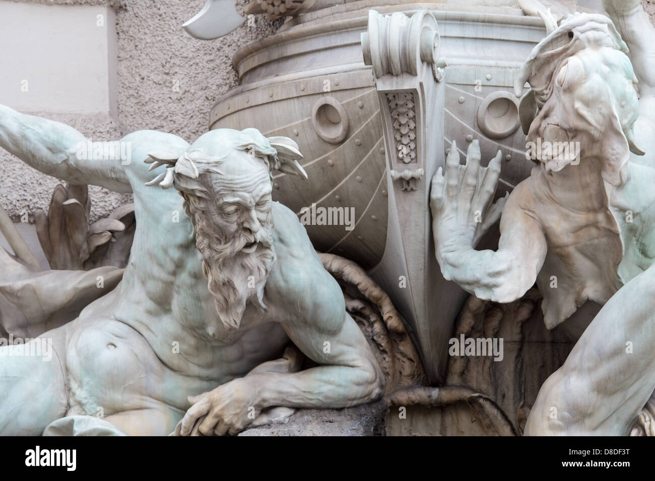 Two marble fountain statues in Vienna Stock Photo - Alamy