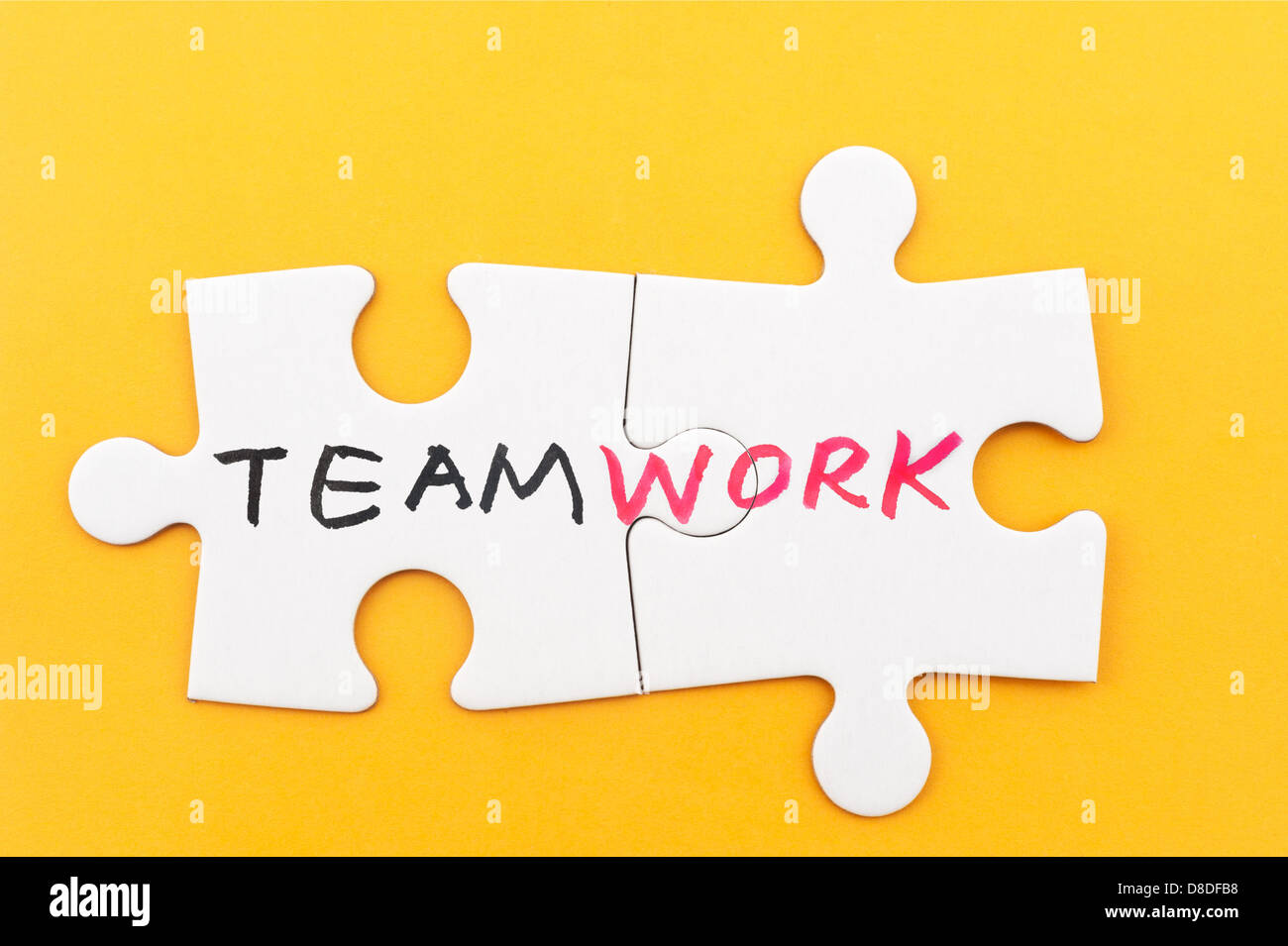 Team work puzzles hi-res stock photography and images - Alamy