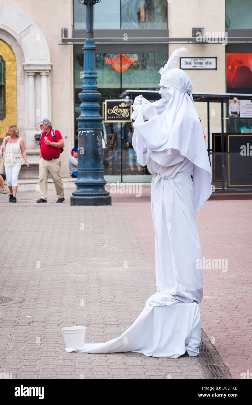 Hungary Budapest shopping precinct square mime artist beard white robes ...