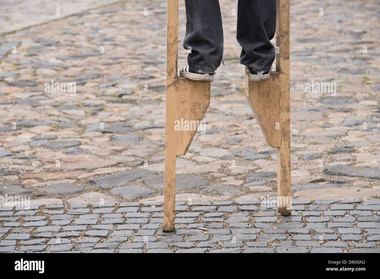 walk on stilts Stock Photo - Alamy