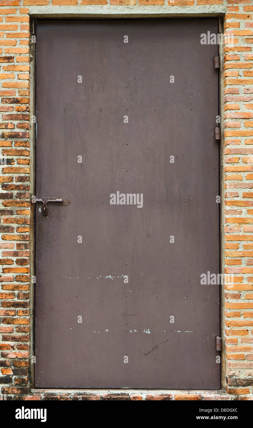 Old steel door on the brick wall Stock Photo - Alamy
