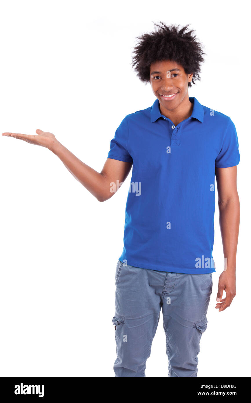 Portrait of a young african american man holding something, isolated on ...