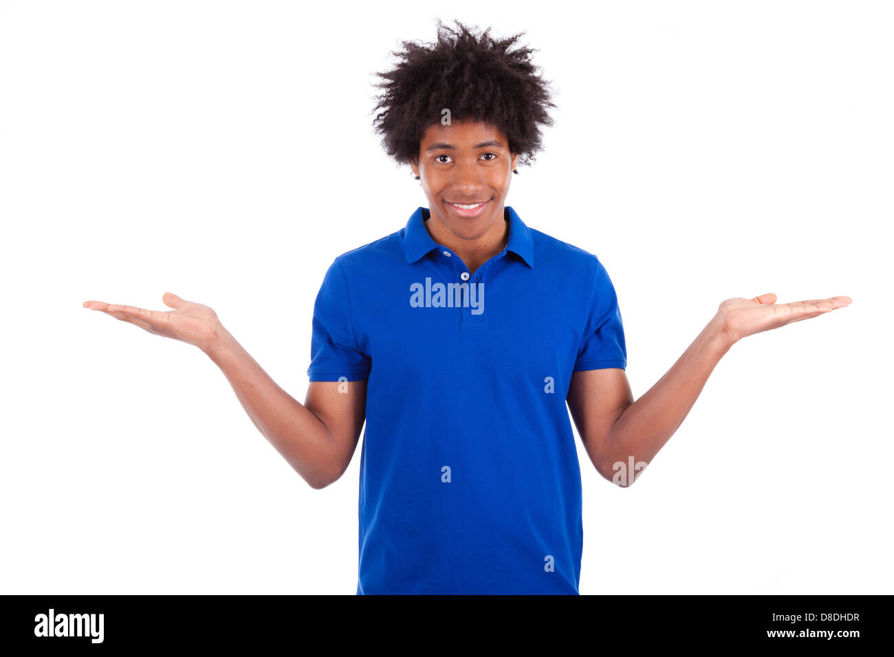 Portrait of a young african american man holding something, isolated on ...