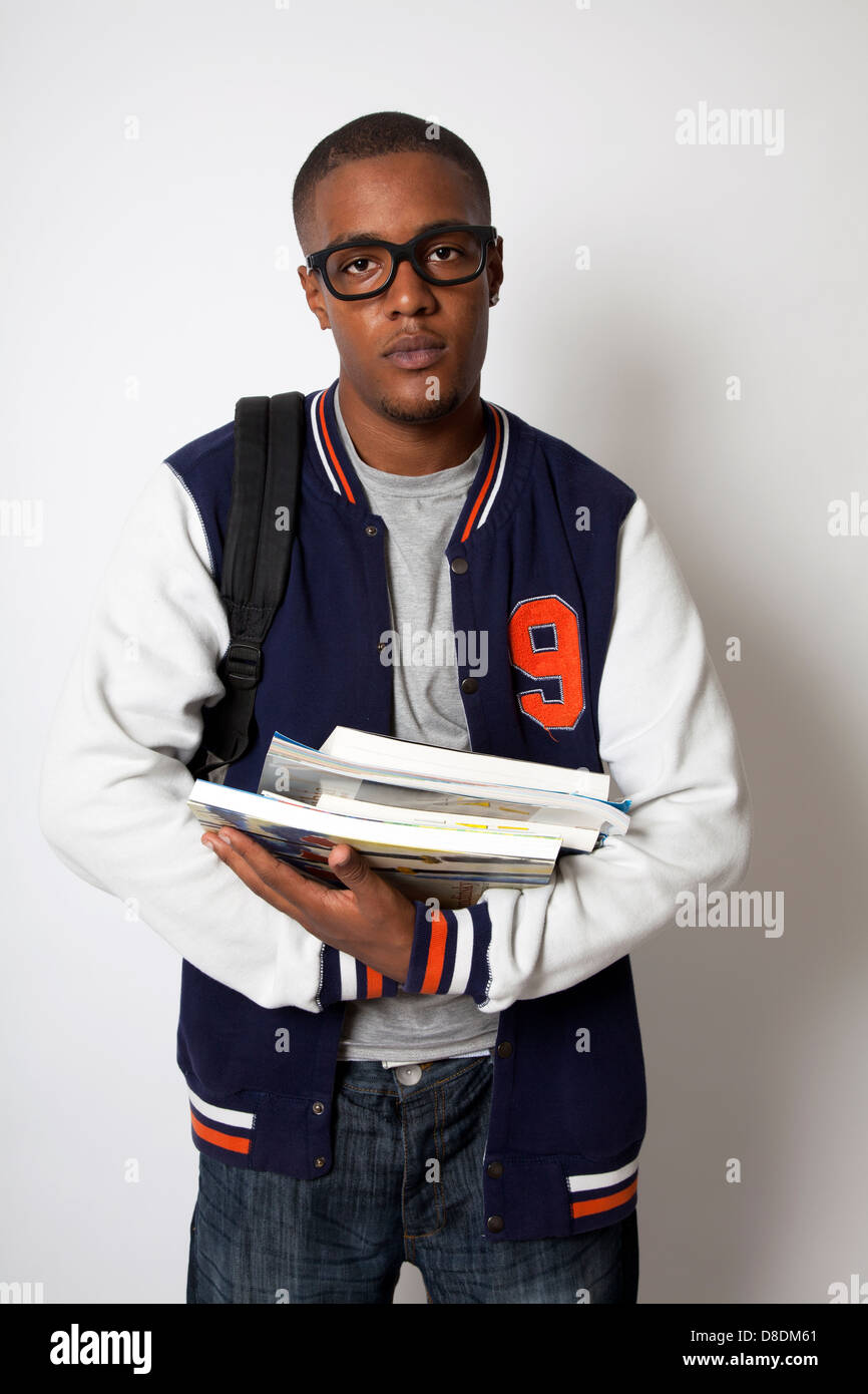 Black Student Portrait Holding Books Stock Photo - Alamy