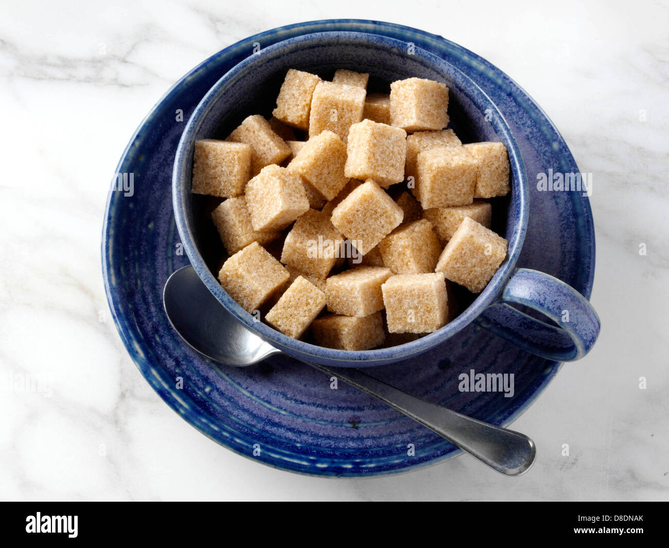 Brown sugar lumps demerara cubes unrefined cane Stock Photo - Alamy