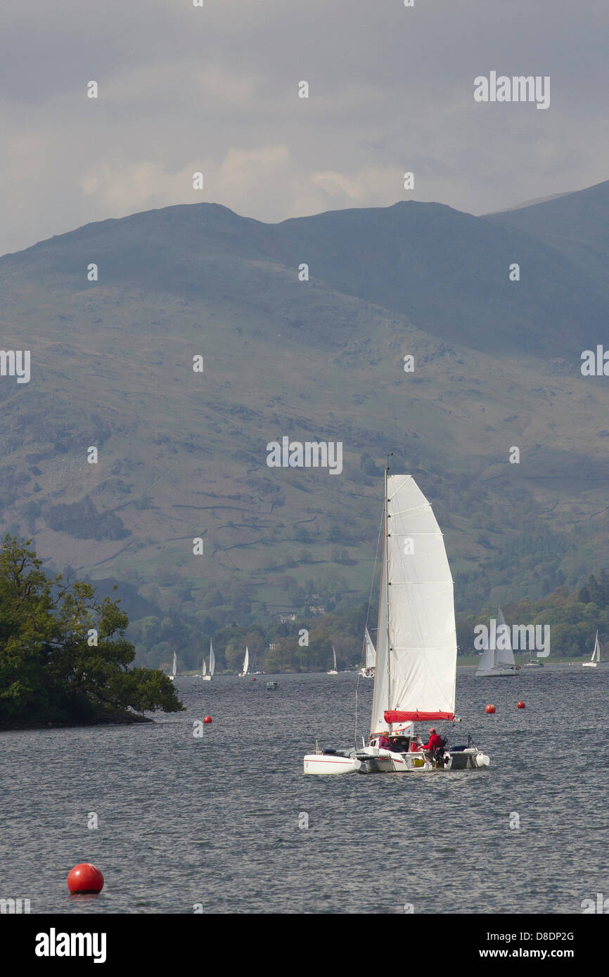 Day out activity sail tourists out sailing fells background hi-res ...