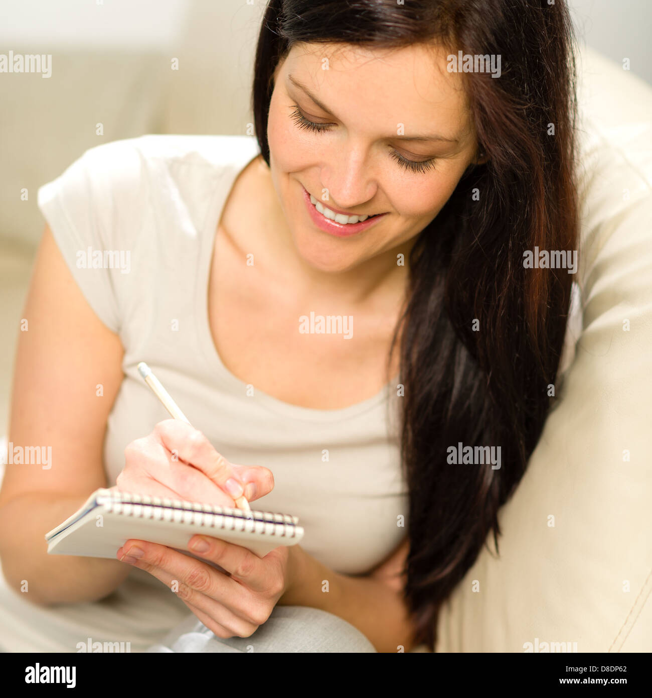 Girl smiling pensive hi-res stock photography and images - Alamy