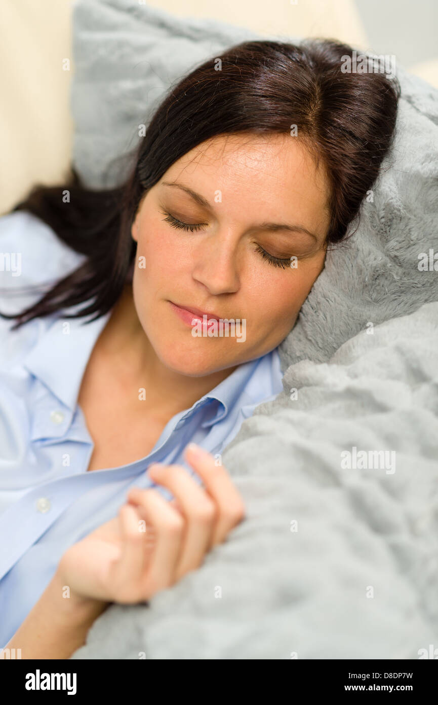 Peaceful portrait of woman sleeping on pillow Stock Photo - Alamy