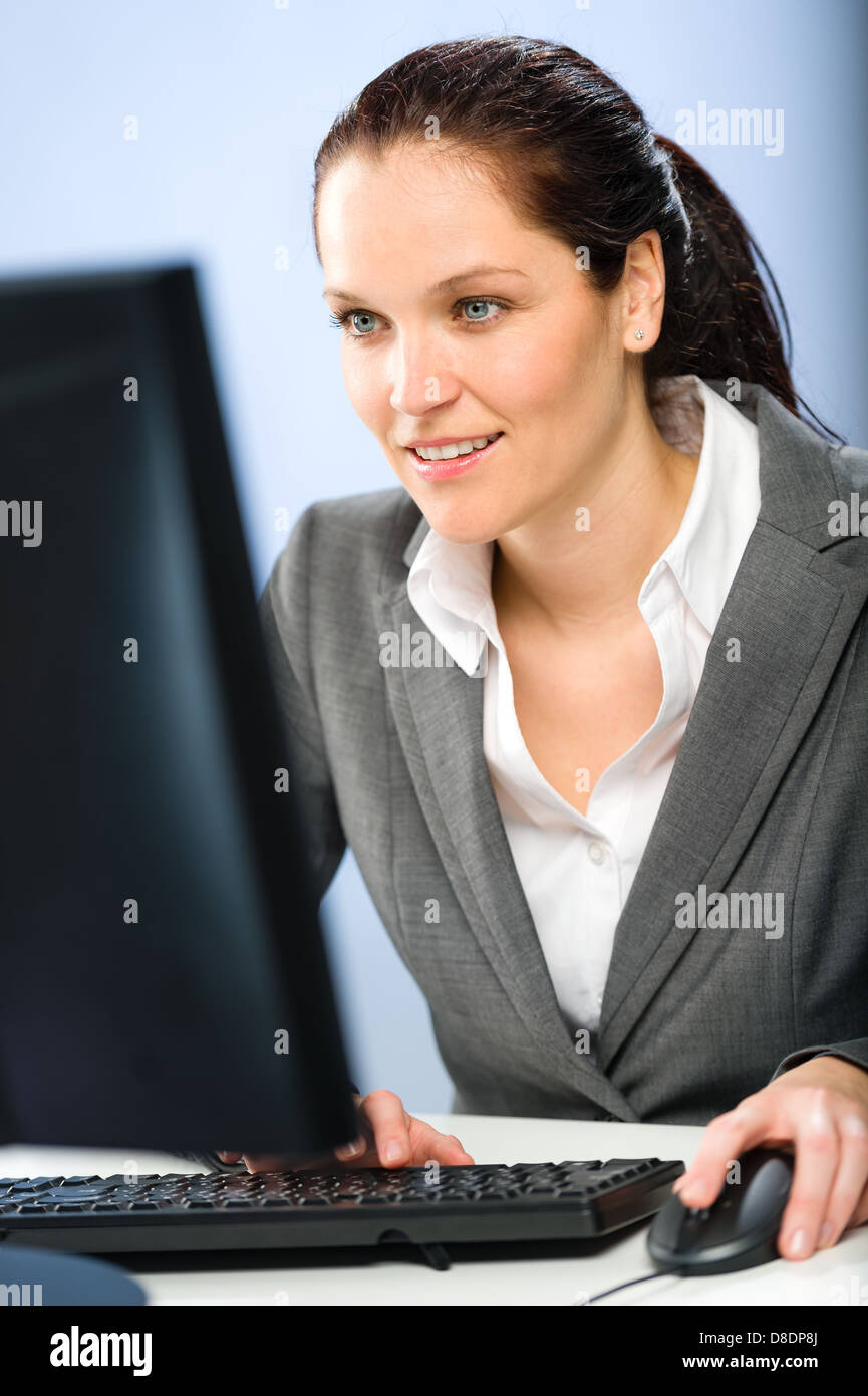 Working at the computer hi-res stock photography and images - Alamy
