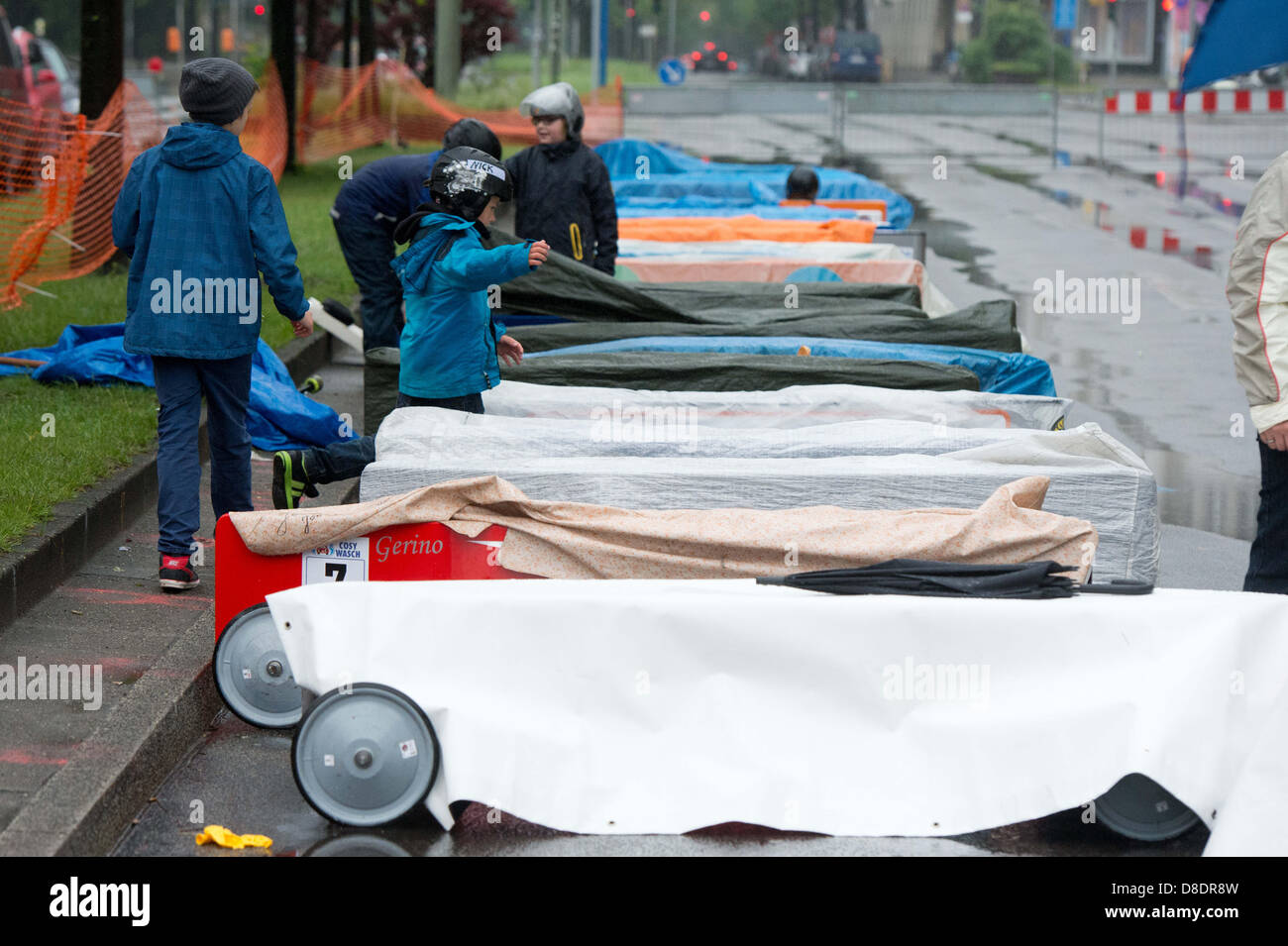 Berlin, Germany. 26th May 2013. Soap box race cars are covered with ...