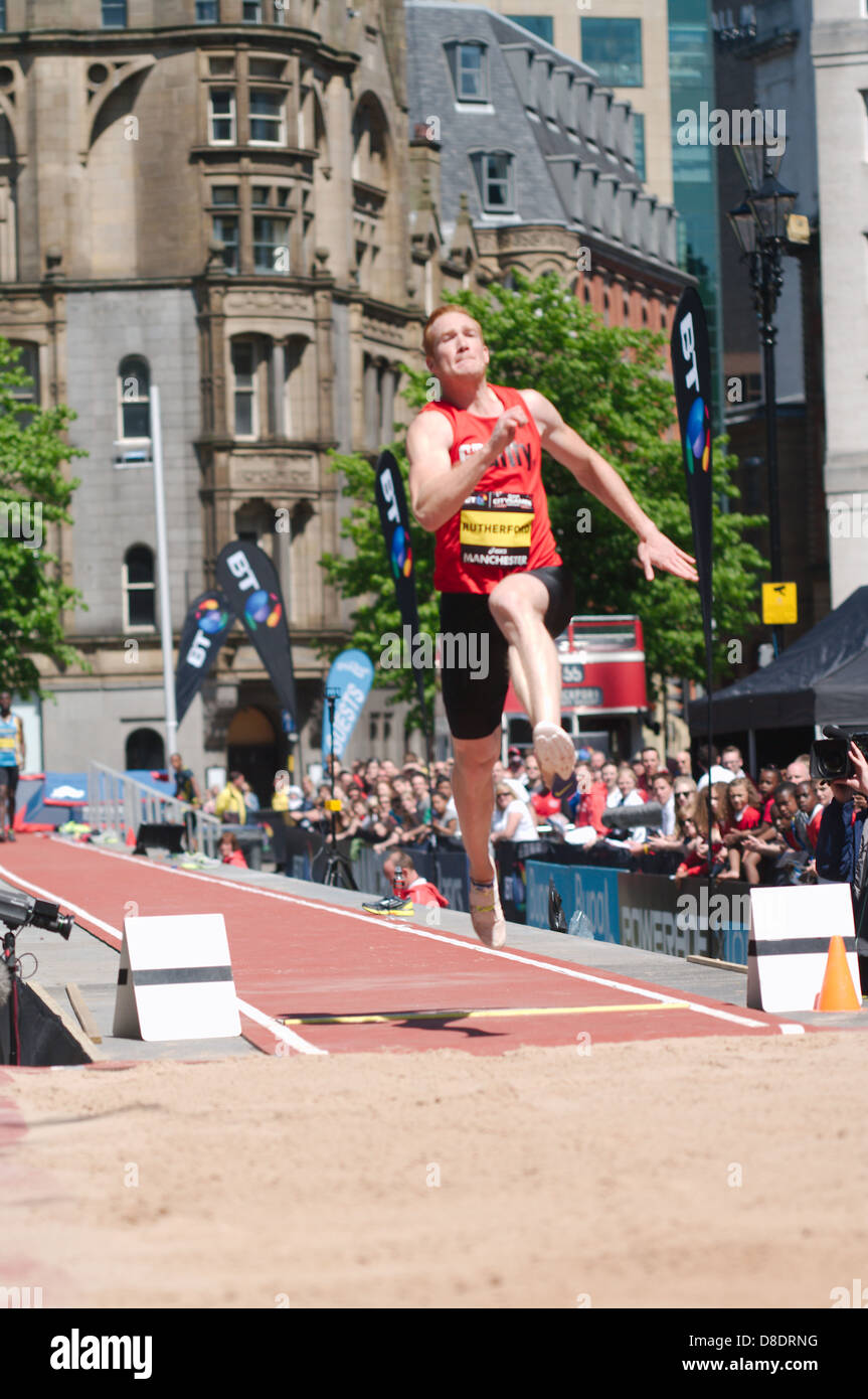 Greg Rutherford competing in the long jump at the BT Great City Games ...