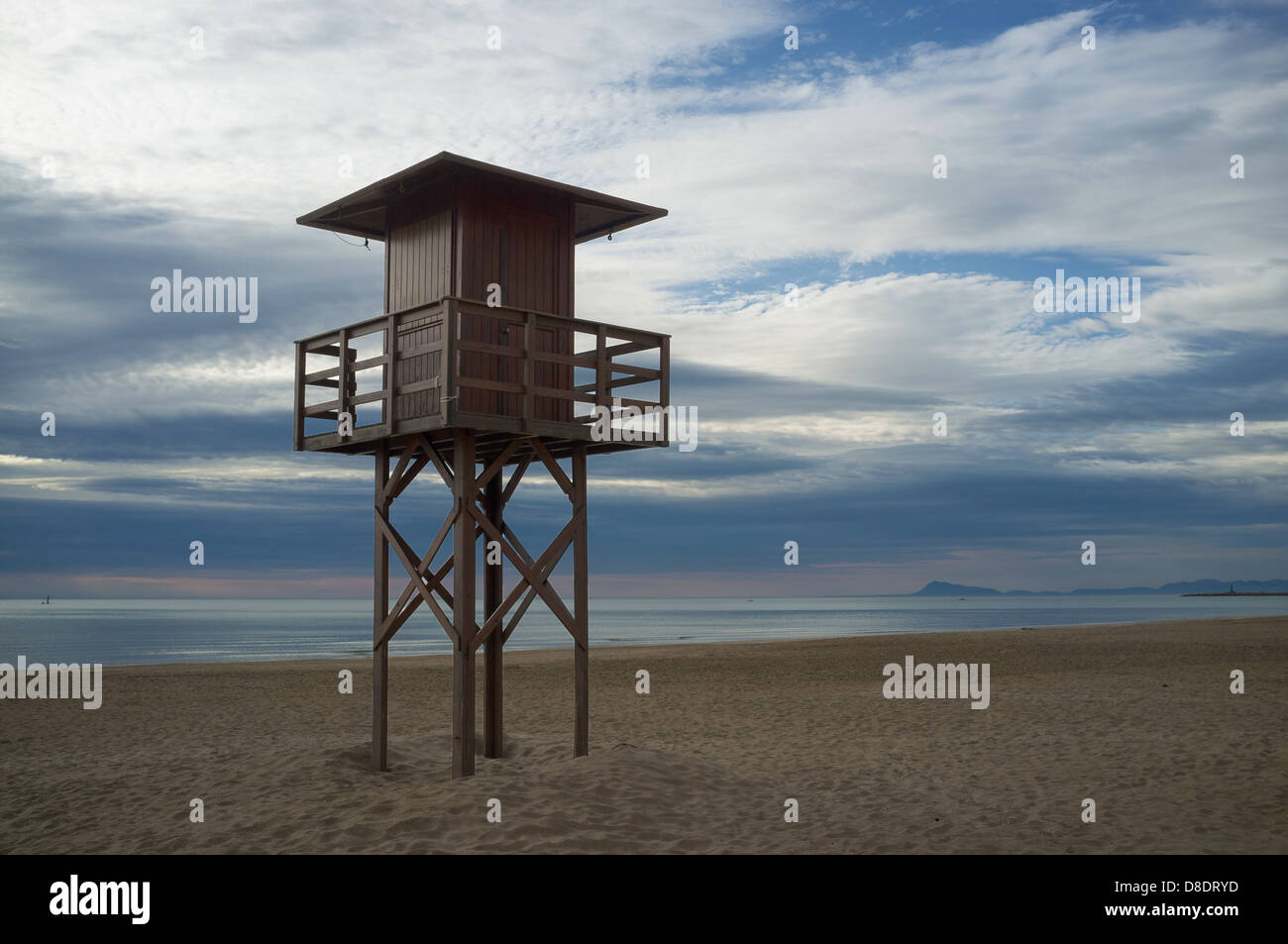Lifeguard watchtower early morning on an empty beach Stock Photo - Alamy