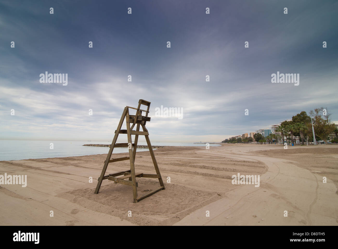 Bad weather approaching an empty resort beach Stock Photo - Alamy