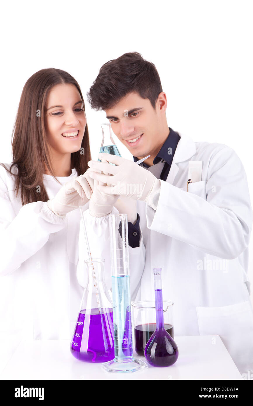 Team of young scientists at laboratory Stock Photo - Alamy