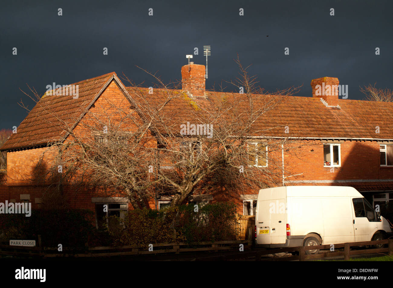 House in rain storm hi-res stock photography and images - Alamy