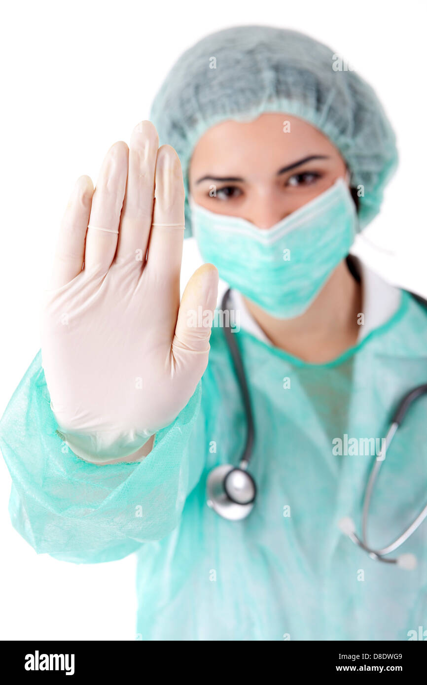 Young nurse making stop sign Stock Photo - Alamy