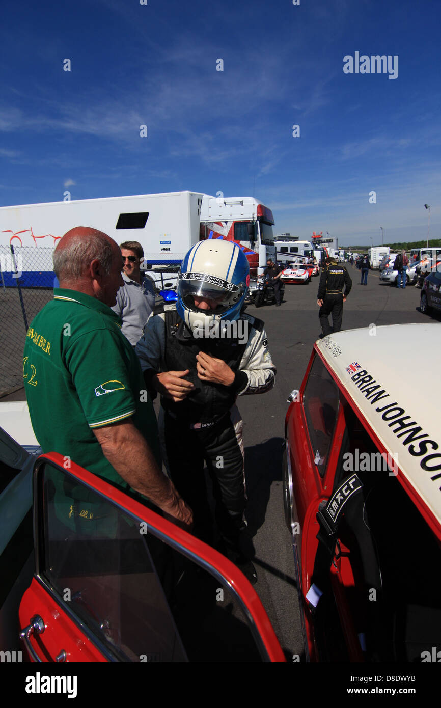 AC/DC frontman Brian Johnson climbs into his Mini race car at the 2013 ...